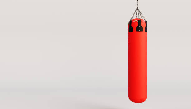 Free Stock Photo of Red Punching Bag Hanging From Metal Rack | Download ...