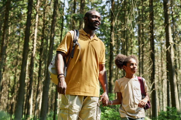 Free Stock Photo of Man and Little Girl Walking Through Forest ...