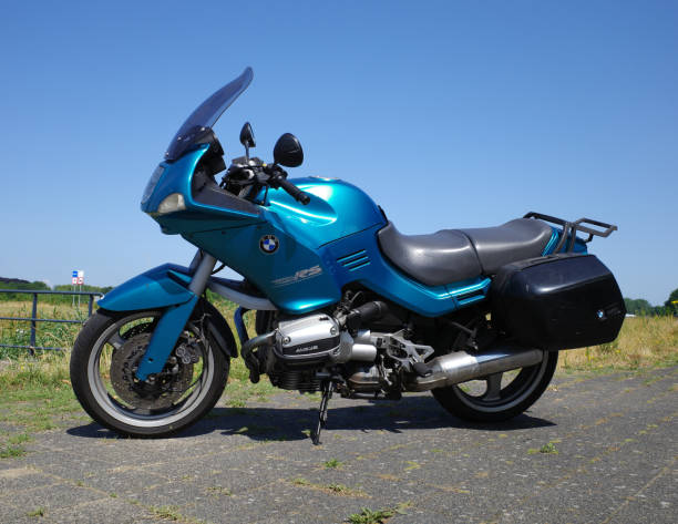 Free Stock Photo of Blue and Silver Motorcycle Parked Next to Stone ...