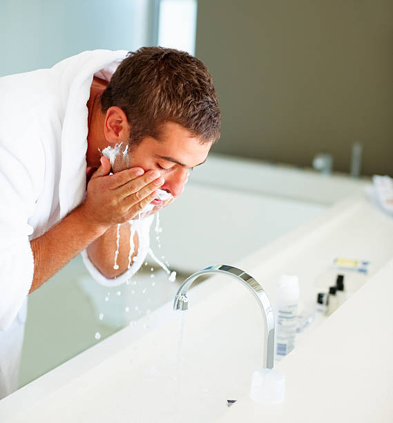 Guy Washing Face