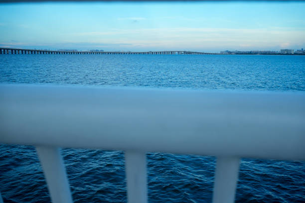 Free Stock Photo of Two Metal Railings Overlooking Body of Water ...