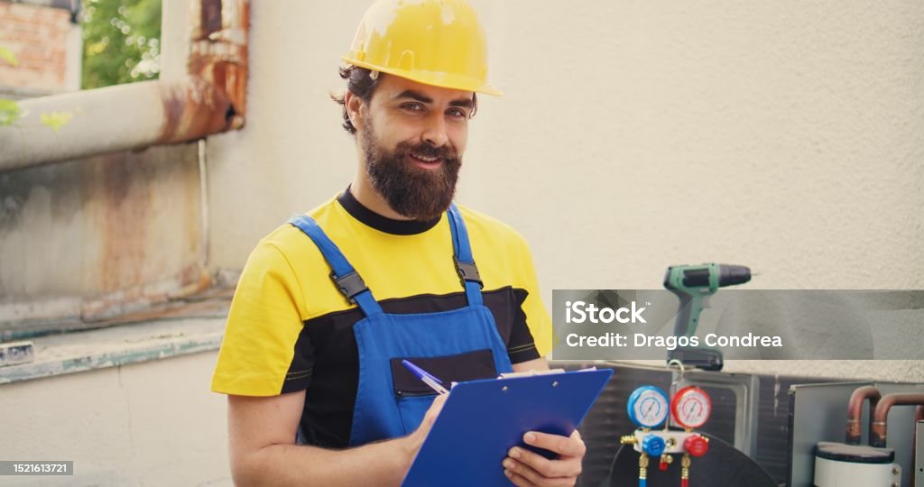 Technician Inspecting Freon Levels Stock Photo - Download Image Now ... Technician Inspecting Freon Levels Stock Photo - Download Image Now ...