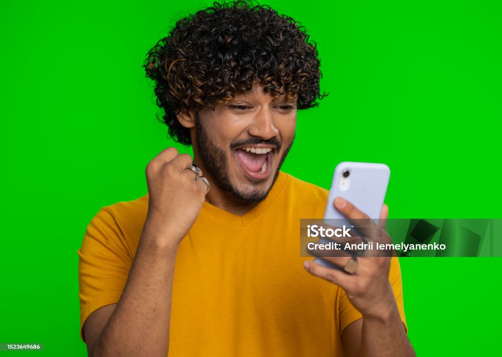 Happy Excited Indian Winner Man Use Smartphone Say Wow Yes Found Out