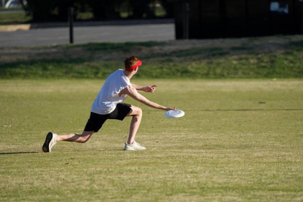 Free Stock Photo of Group of Men Standing Around Holding a Frisbee ...