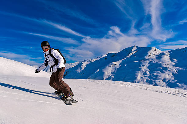 Free Stock Photo of Man Riding Snowboard Down Mountain | Download Free ...