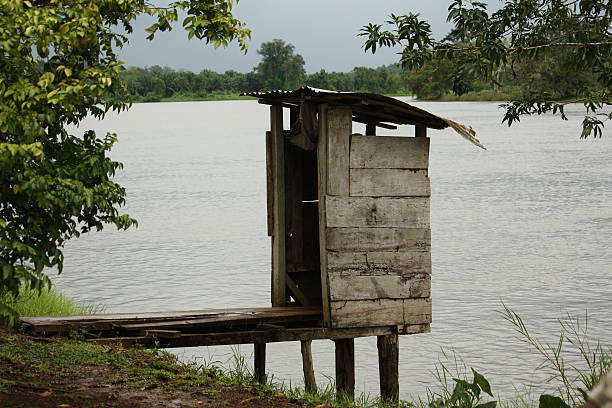 Free picture: Toilet above water, shed-like structure in a poor ...