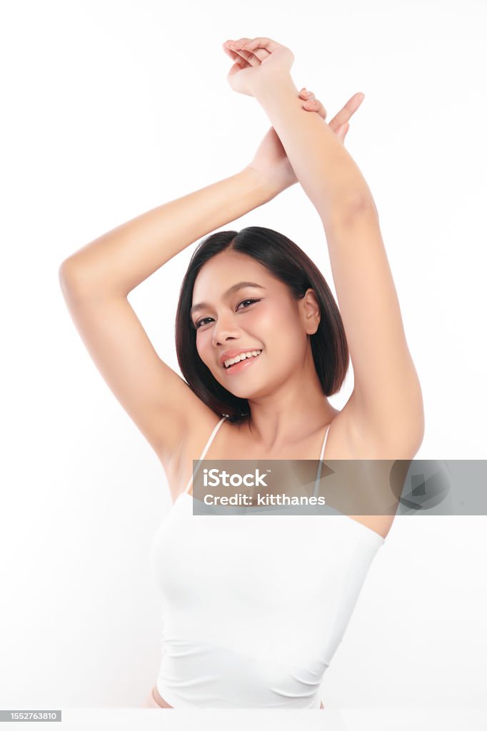 Beautiful Young Asian Woman Lifting Hands Up To Show Off Clean And