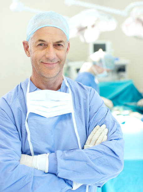 1,200+ Surgeon Team Working Together In A Surgical Room Stock Photos ... 1,200+ Surgeon Team Working Together In A Surgical Room Stock Photos ...