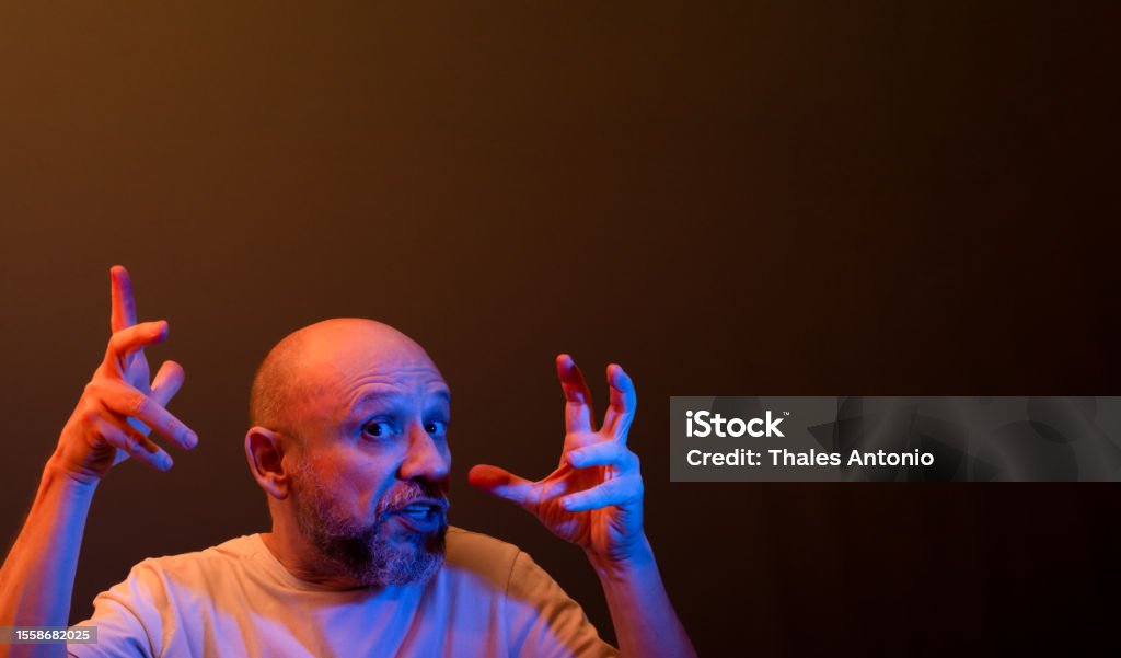 Happy Bald Bearded Man Making Funny Hand Gestures Concept Of Strength