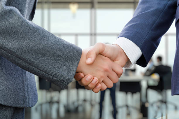Free Stock Photo of Polite handshake between two business people ...