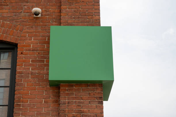 Free Stock Photo of Red Brick Wall With Green Sign | Download Free ...