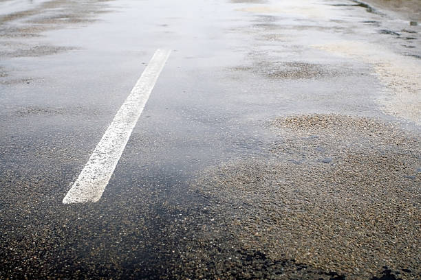 Free picture: Reflection of traffic sign on wet asphalt road