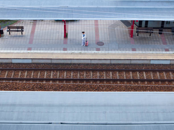 Free Stock Photo of Person Standing on Ledge Next to Train Track ...