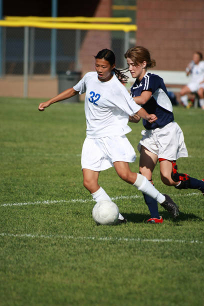 Free Stock Photo of Soccer players pushing each other for a ball ...