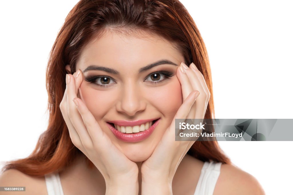 Beautiful Young Smiling Redhead Women With Makeup And Long Hair On A