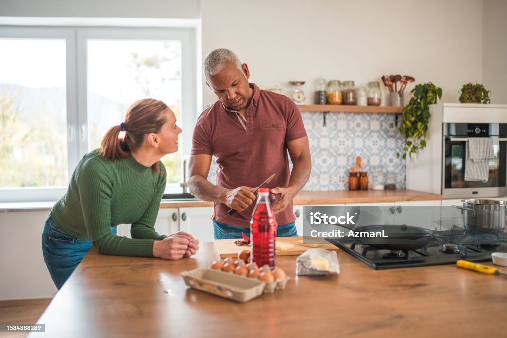 Handsome Mature Multiethnic Couple Embraces Love And Bonding In The