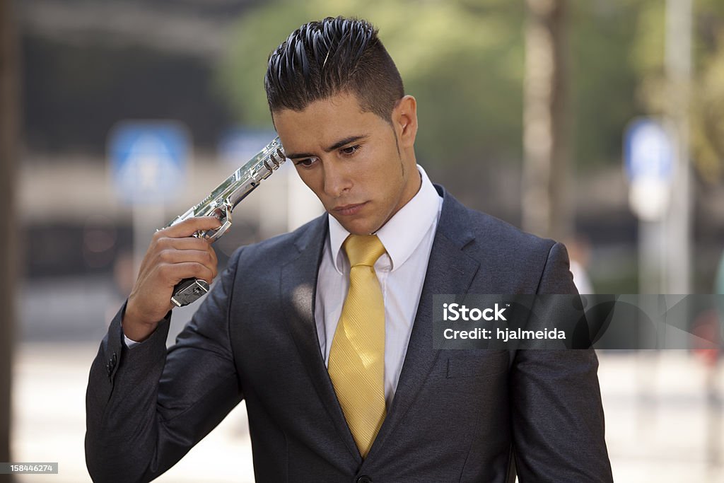 Businessman Aiming A Handgun At His Head Stock Photo - Download Image ... Businessman Aiming A Handgun At His Head Stock Photo - Download Image ...