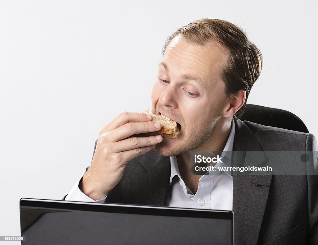 Multi Tasking Businessman Eats And Works Stock Photo - Download Image ... Multi Tasking Businessman Eats And Works Stock Photo - Download Image ...