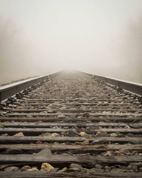 Free Stock Photo of Mysterious figure on foggy railroad tracks ...