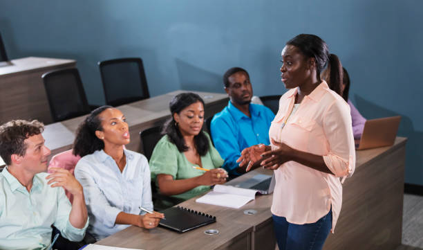 Free Stock Photo of African American teacher teaching small group ...