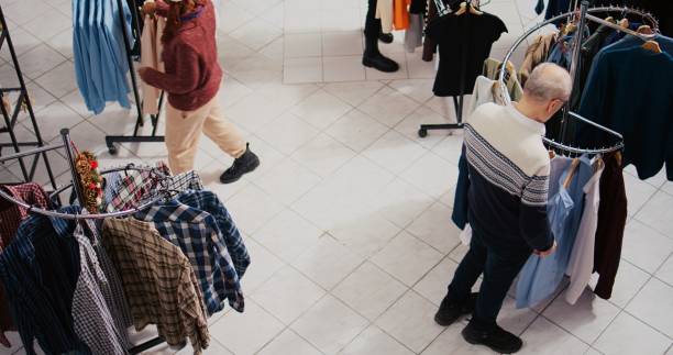 Free Stock Photo of Overhead View of Clothing Store With Clothes on ...