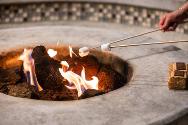 Free Stock Photo of A hand holding a smores over a fire | Download Free ...