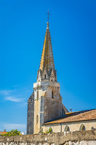 Bell Tower Of Notredamedelassomption Church In Saintemariederé Stock
