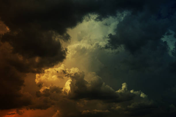 Free picture: Hazy orange sky at sunset with dark clouds