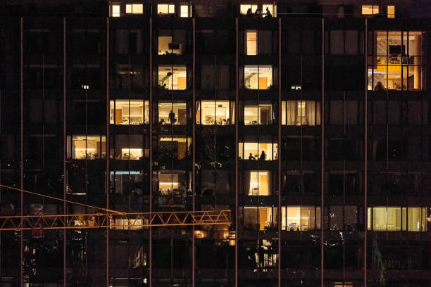 Free Stock Photo of Tall Building With Many Windows Illuminated at ...