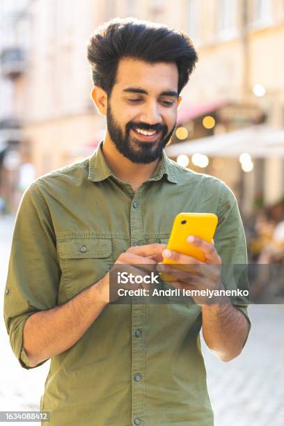 Indian Man Use Smartphone Typing Text Messages Browsing Internet