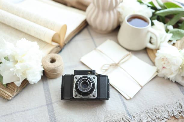 Free Stock Photo of Vintage camera on desk with photography book ...