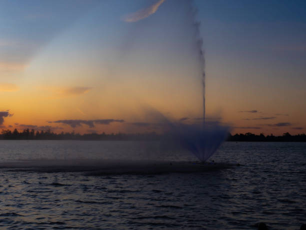 Free Stock Photo of Fountain silhouette against a vibrant sunset sky ...