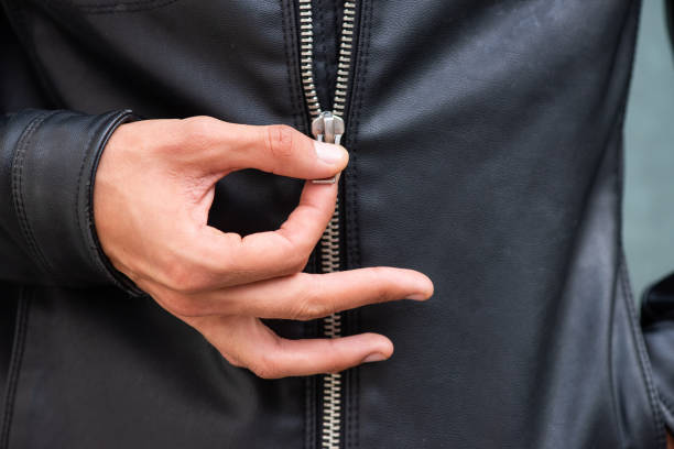 Free Stock Photo of A close up of a man s hands buttoning a jacket ...