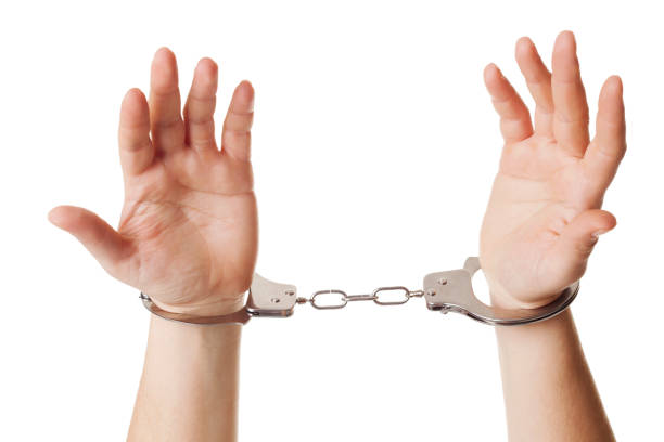 15400 Handcuffed Hands Fotos De Stock Imagens E Fotos Royalty Free