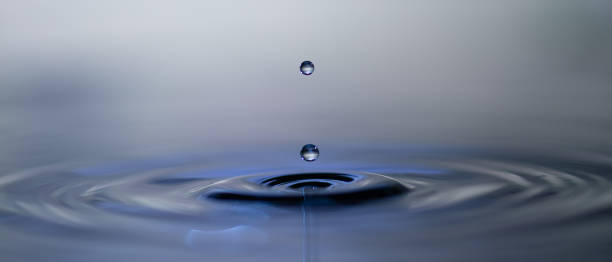Free Stock Photo of Raindrop ripple on a calm water surface | Download ...