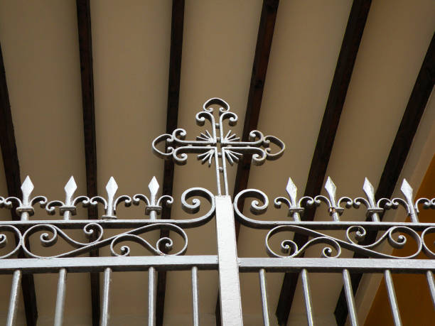 Free picture: Handmade cast iron catholic cross on fence