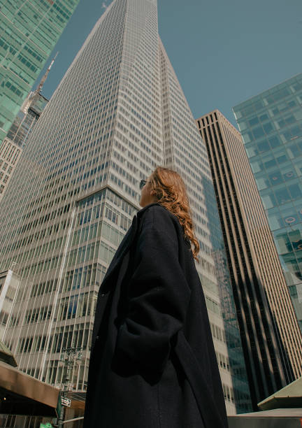 Free Stock Photo of Woman looking up at modern architecture | Download ...