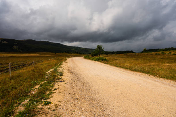 Free Stock Photo of Desolate country road under stormy skies | Download ...