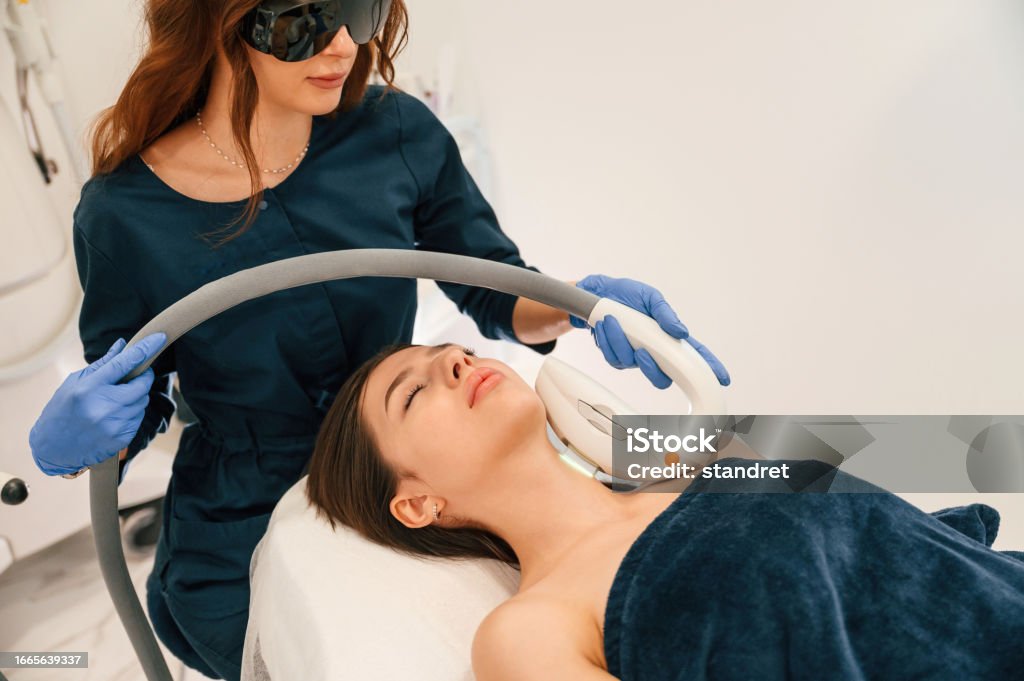 Woman Is Getting Lpg Hardware Massage In Beauty Salon Getting Photo
