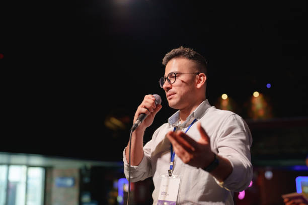 Free Stock Photo of Person Standing on Stage With Microphone | Download ...
