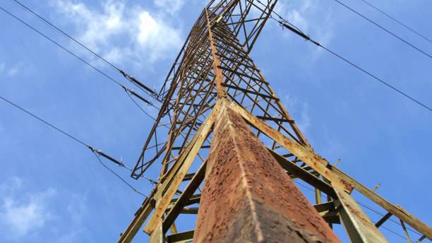 Free picture: Rusty electric tower in front of building in socialism ...