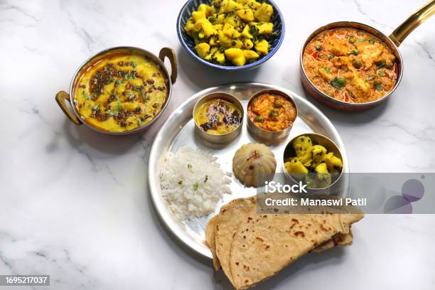 Indian Vegetarian Thali Or Platter Includes Aloo Ki Sabji Dal Rice Roti