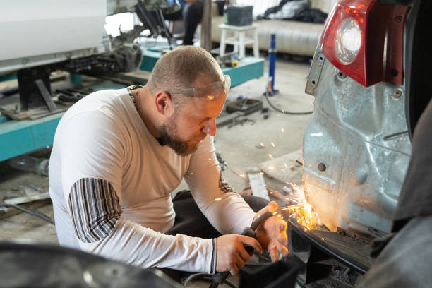 Free Stock Photo of Man Welding a Car in a Garage | Download Free ...