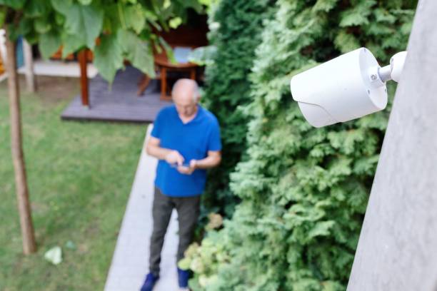 Free Stock Photo of Two people under surveillance camera wall ...