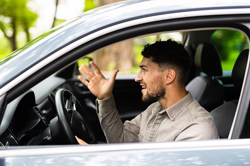 Young Handsome Man Driving Car With Furious Expression At Street Stock ... Young Handsome Man Driving Car With Furious Expression At Street Stock ...