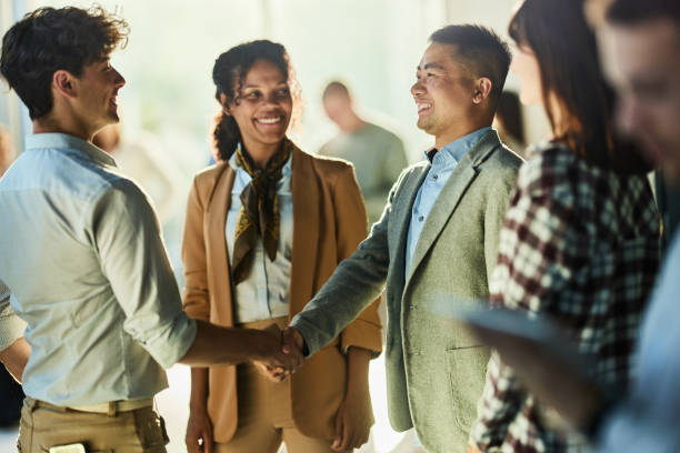 Free Stock Photo of Group of people greeting each other in a lobby ...