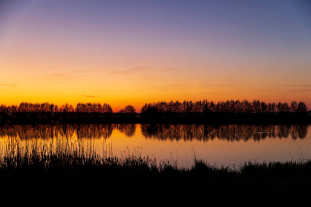 Free picture: Orange-yellow sunset over a lake