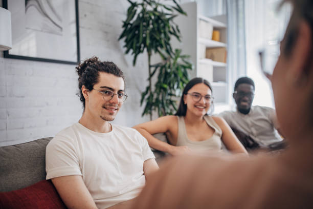 Free Stock Photo of Cozy living room scene with four friends | Download ...