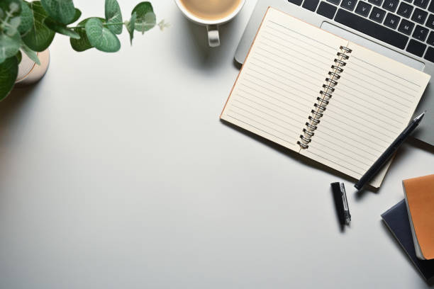 Free Stock Photo of Workspace setup with laptop, coffee, pencils, and ...