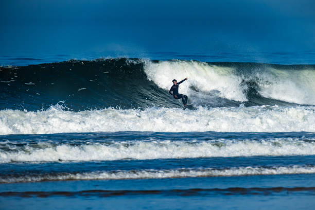 Free Stock Photo of Surfer Riding Large Wave in the Ocean | Download ...